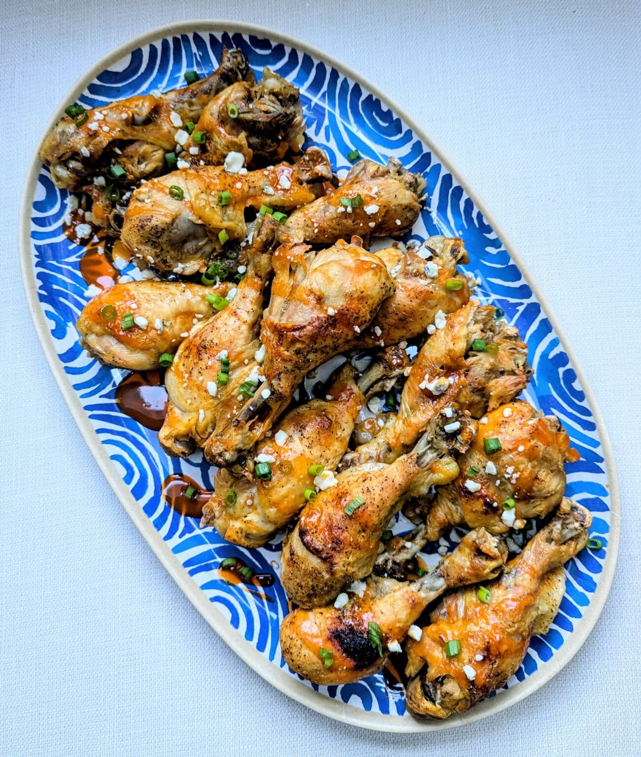 slow-cooker-buffalo-chicken-drumsticks-diagonal.jpg - Flavorful Eats