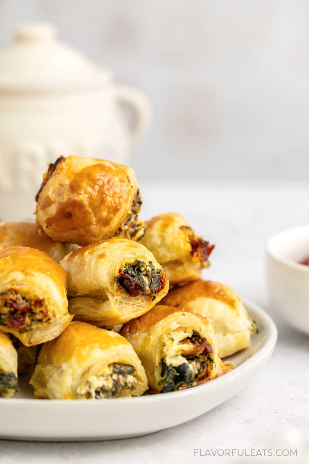 sun-dried-tomato-spinach-puff-pastry-bites-vertical.jpg - Flavorful Eats